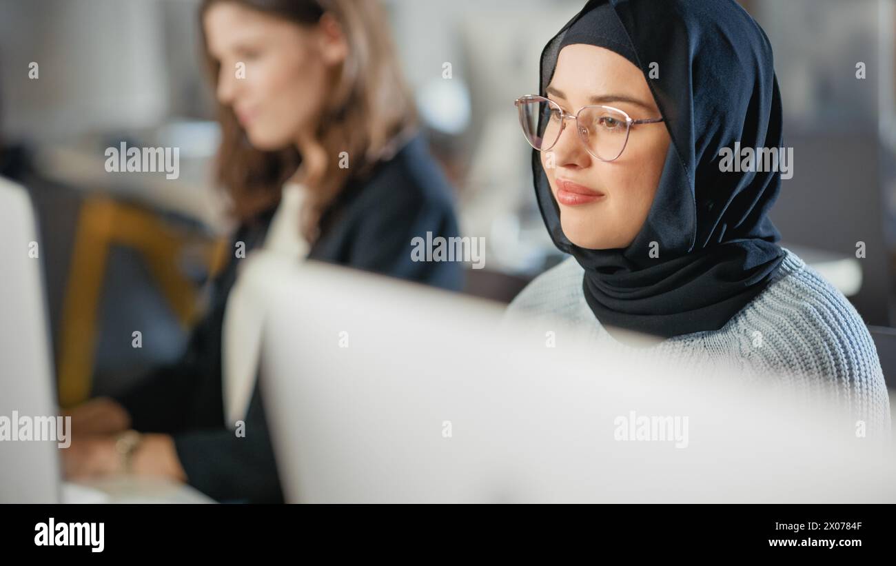 Beautiful Portrait of a Female Muslim Student in Hijab, Studying in ...