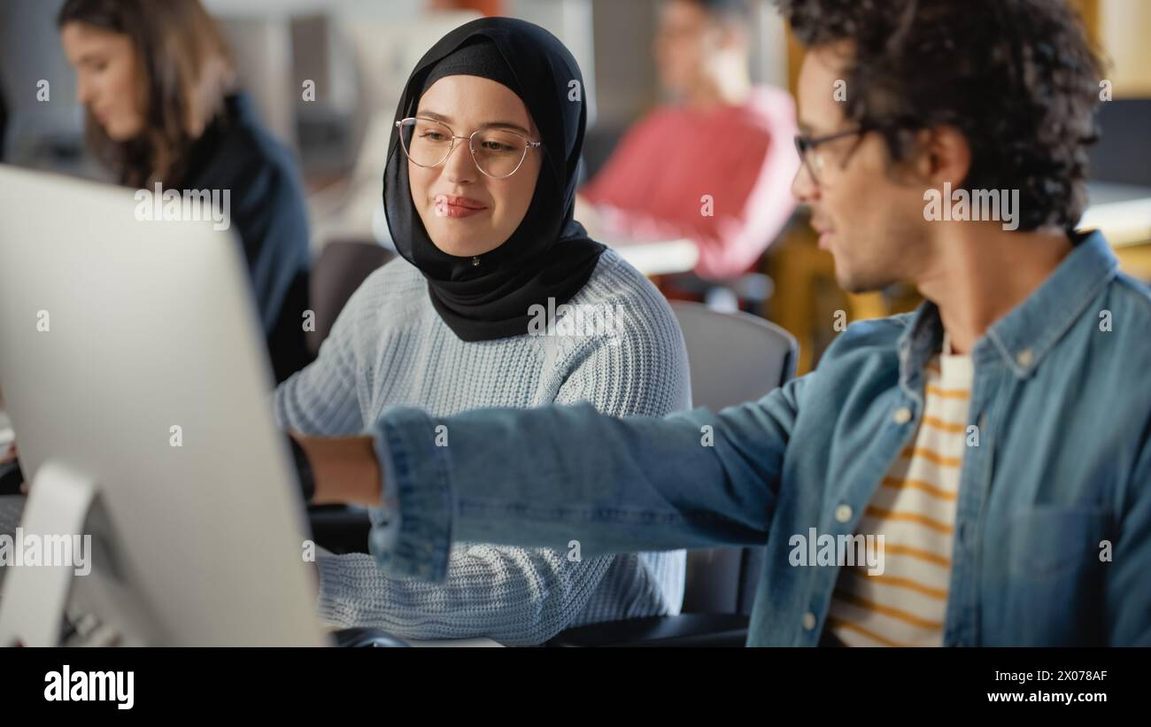 Female Muslim Student Wearing Hijab, Studying in Modern University with ...