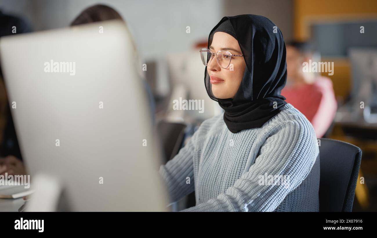 Beautiful Portrait of a Female Muslim Student in Hijab, Studying in ...
