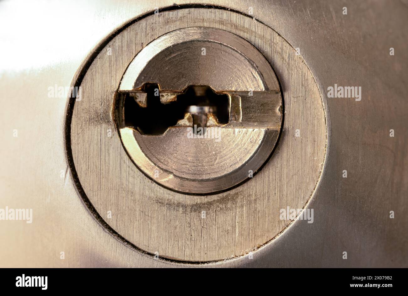 Close up of modern lock with some signs of use, like scratches, and the ...