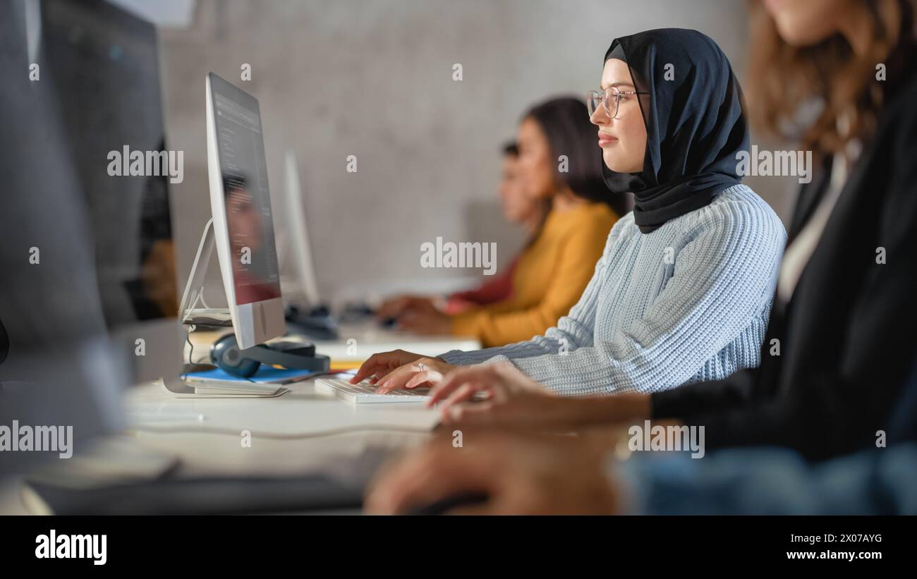 Happy Female Muslim Student Wearing a Hijab, Studying in Modern ...