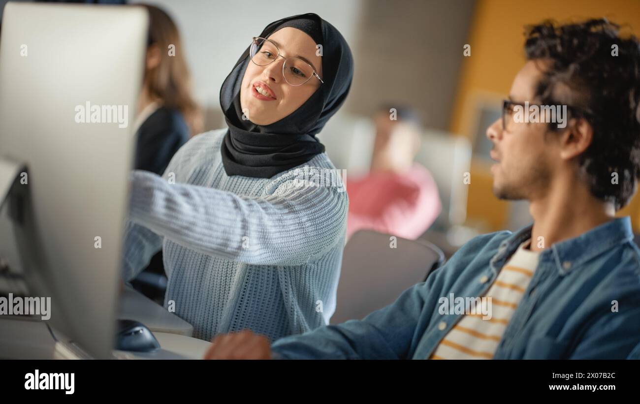 Female Muslim Student Wearing Hijab, Studying in Modern University with ...