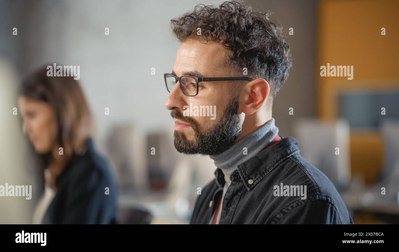 Portrait of a Handsome Concentrated Smart Male Student, Studying in ...