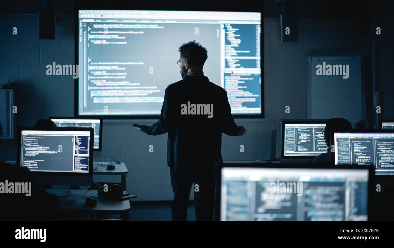 Teacher Giving Computer Science Lecture to Diverse Multiethnic Group of ...