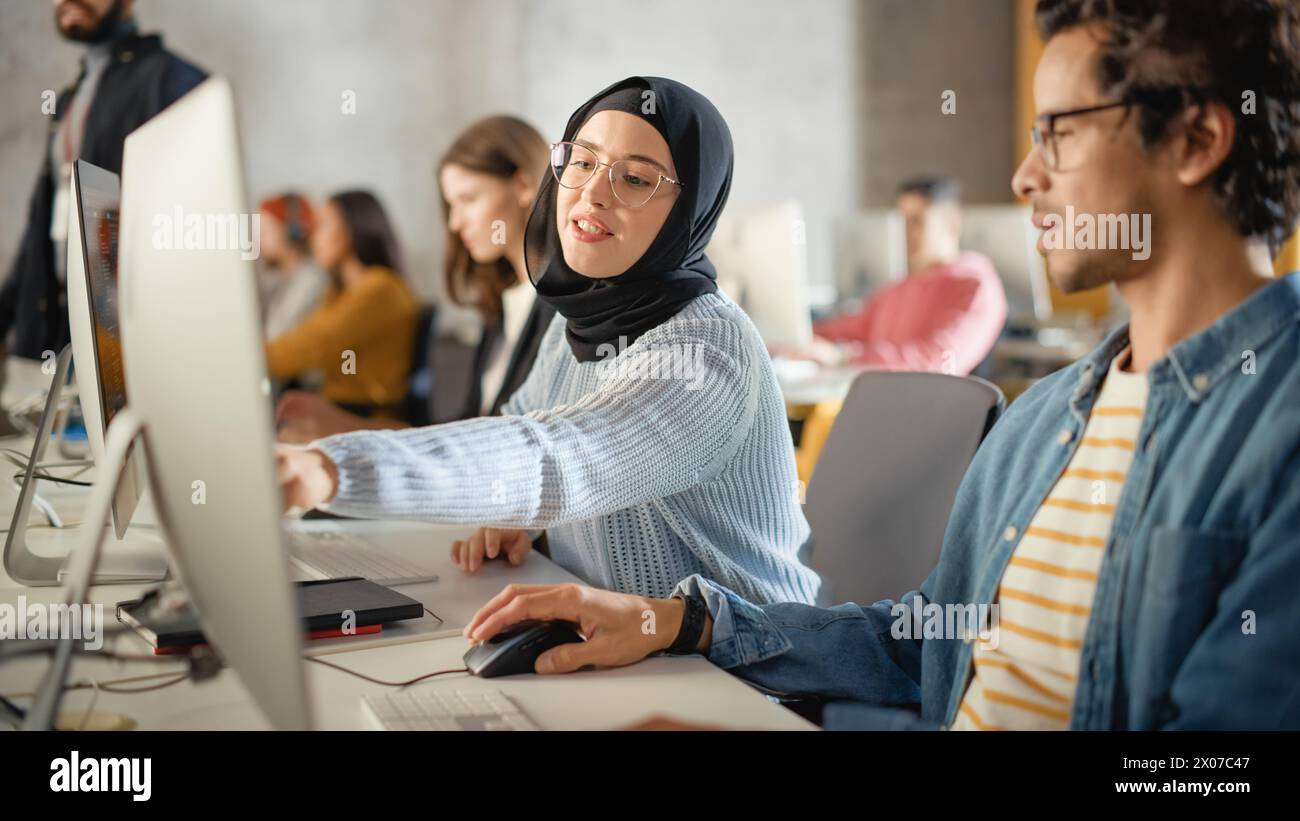 Happy Female Muslim Student Wearing a Hijab, Studying in Modern ...