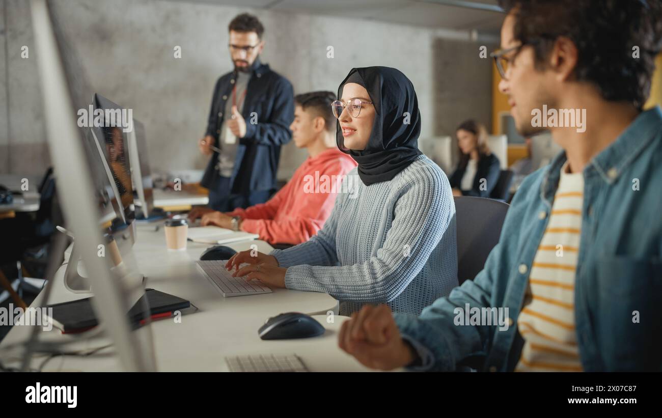 Female Muslim Student Wearing Hijab, Studying in Modern University with ...