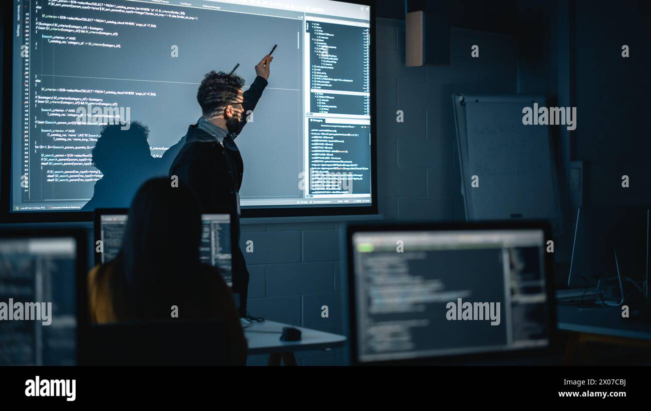 Teacher Giving Computer Science Lecture to Diverse Multiethnic Group of ...