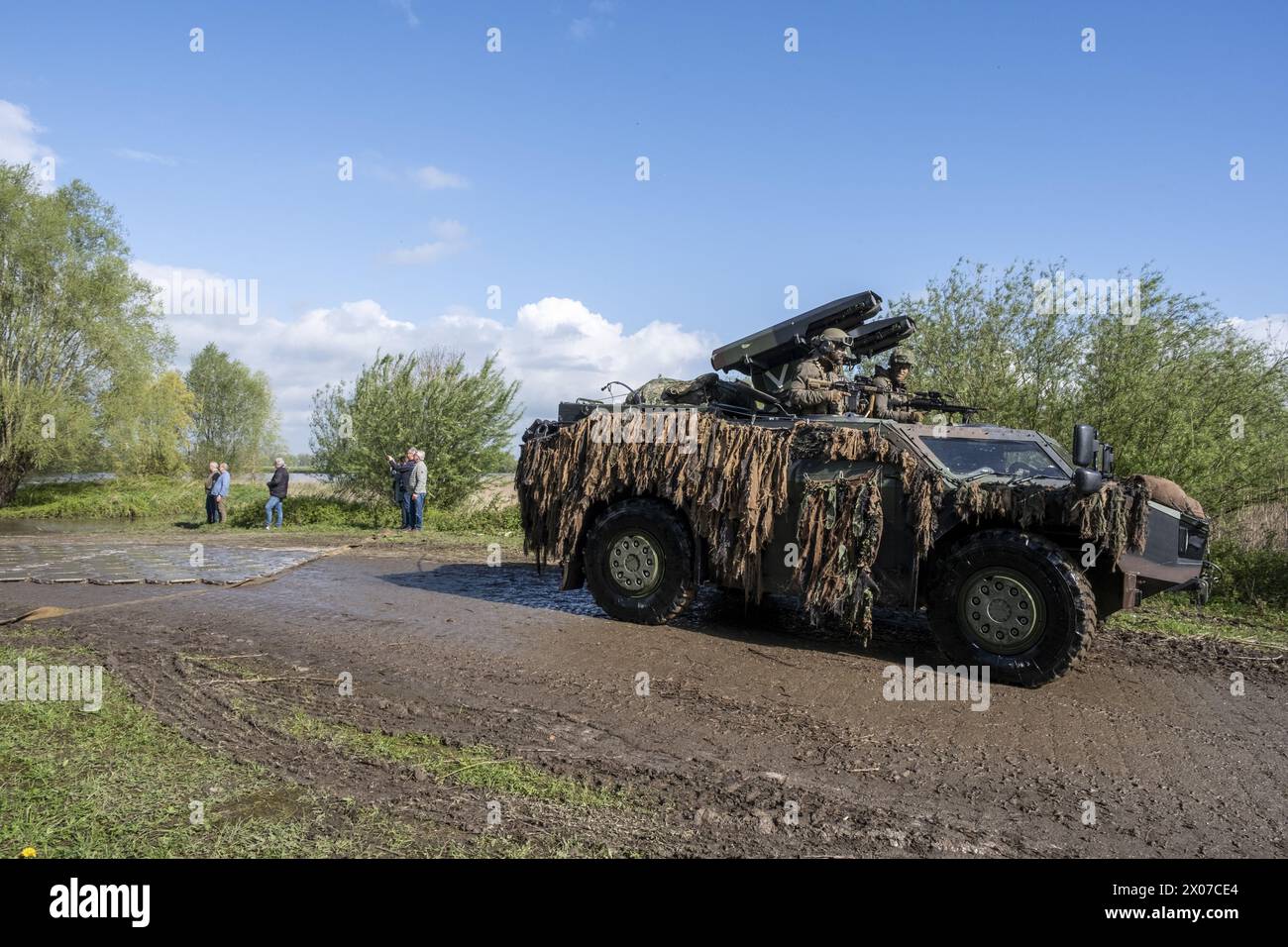 Netherlands, Olst, 10-04-2024, - Army vehicles cross the IJssel on ...