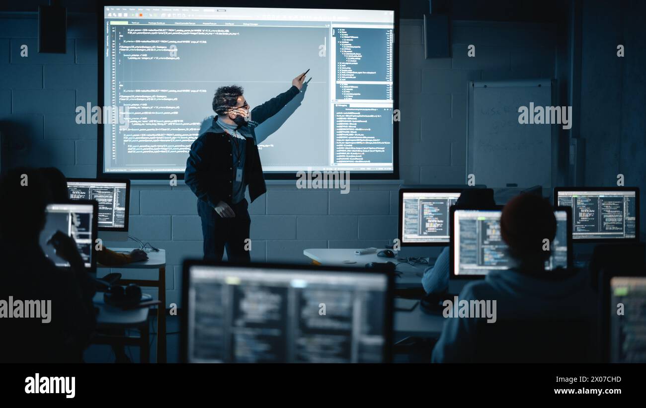 Teacher Giving Computer Science Lecture to Diverse Multiethnic Group of Female and Male Students ...