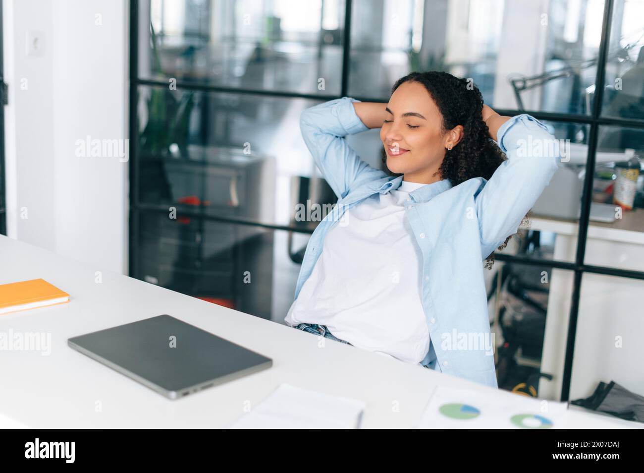 Happy hispanic woman finish work hi-res stock photography and images ...