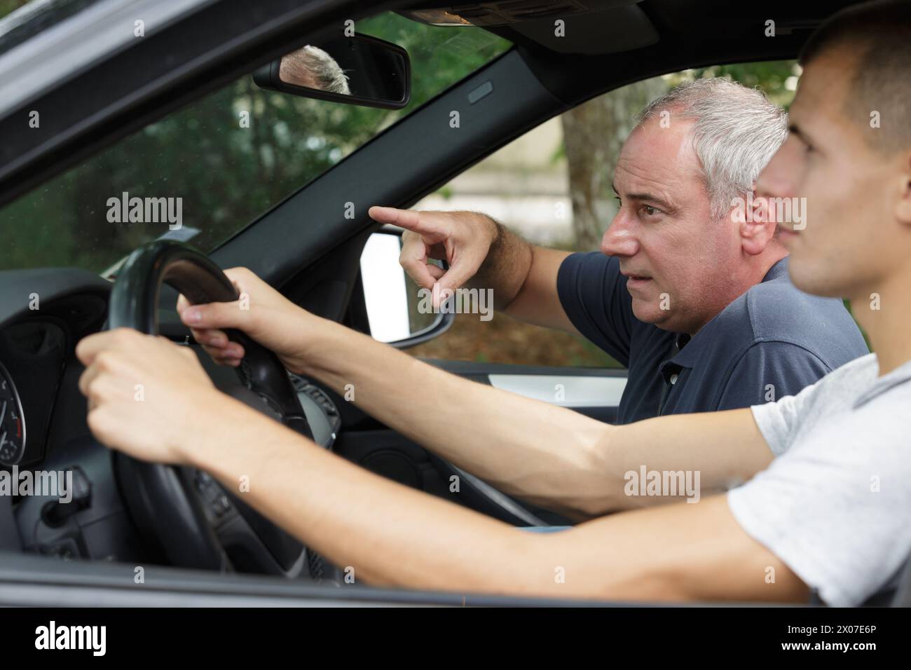 Instructor teacher teaching instructing hi-res stock photography and ...