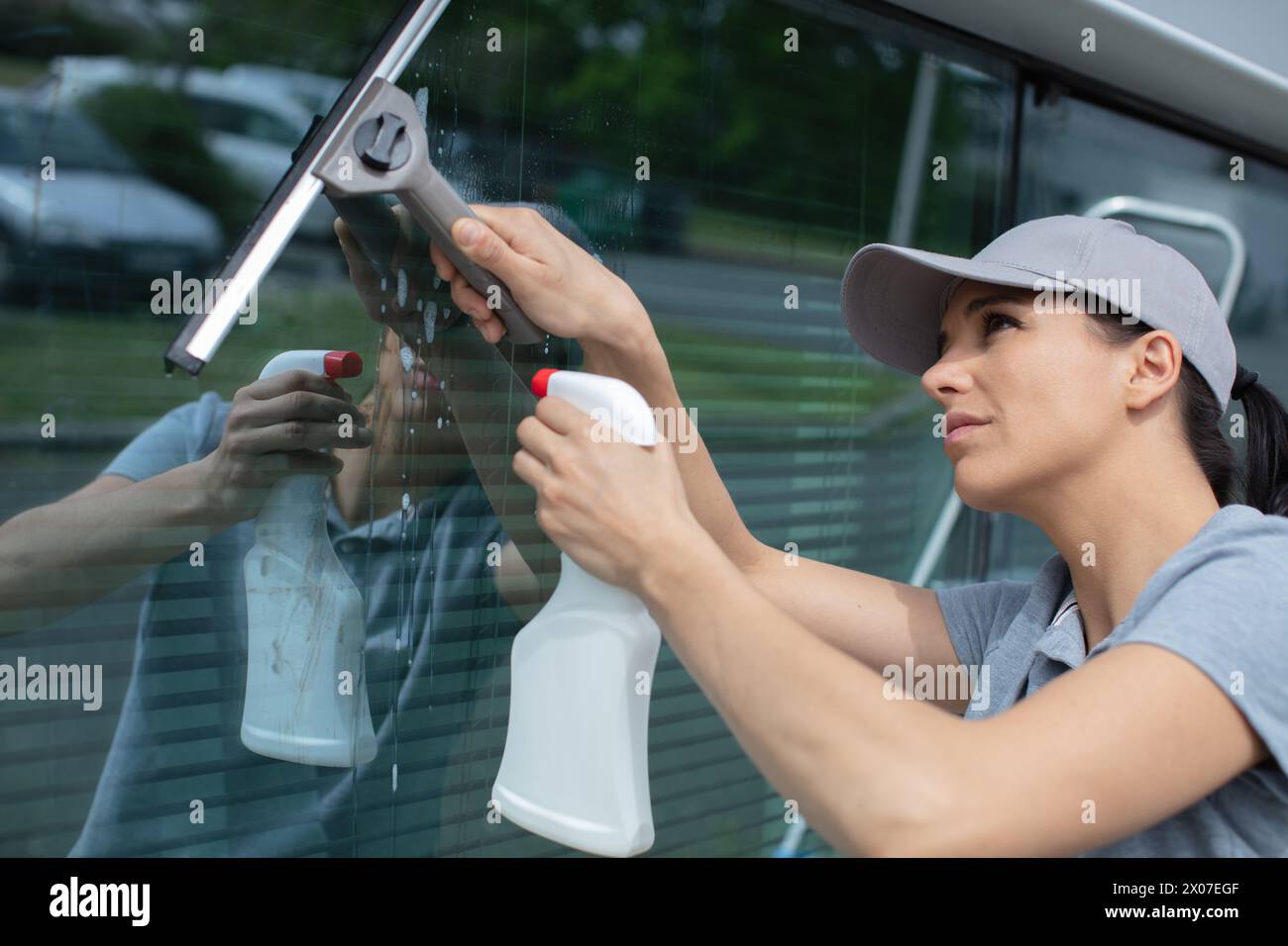 hand cleaning window with blue sky and white clouds Stock Photo - Alamy