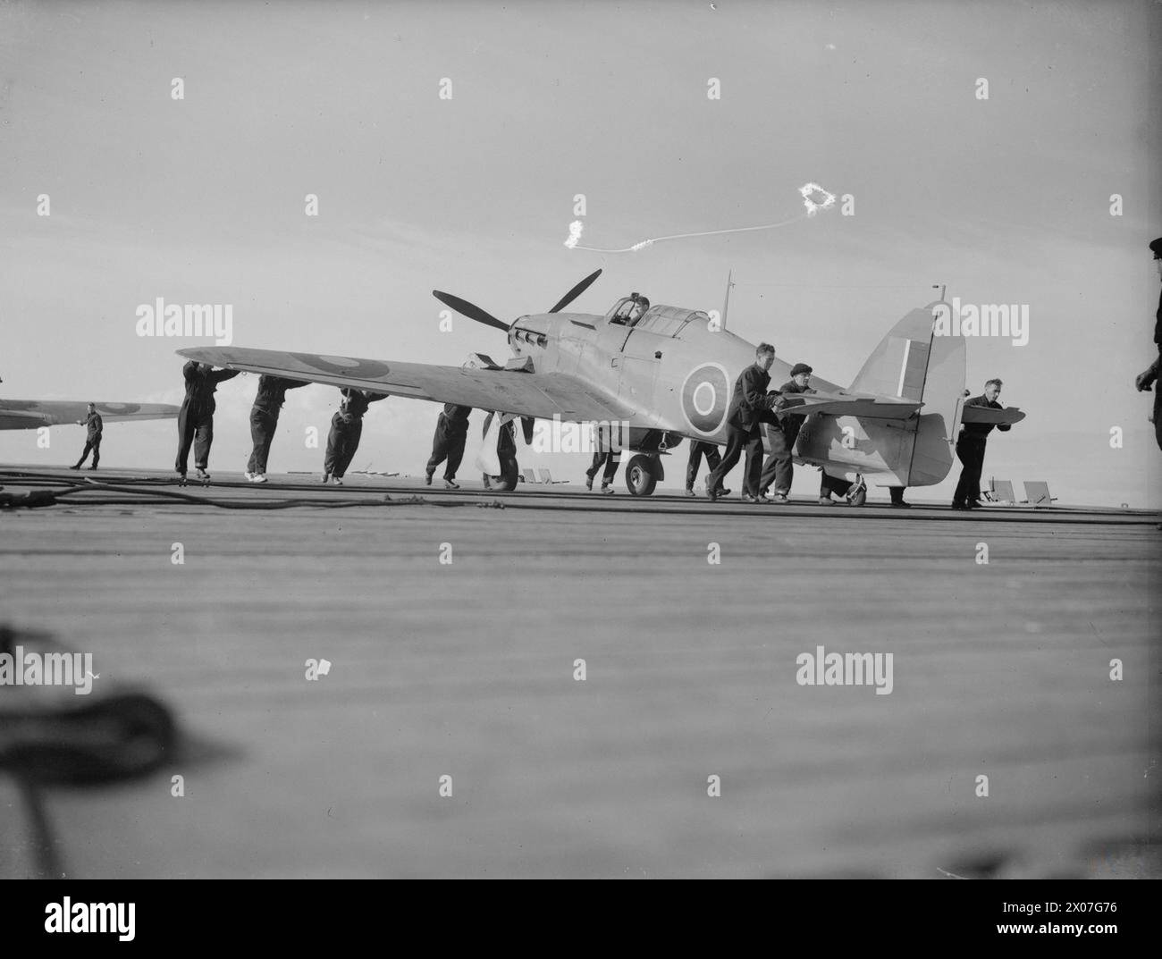 On 27 June 1942, the flight deck party of HMS Avenger ranged a Hawker ...