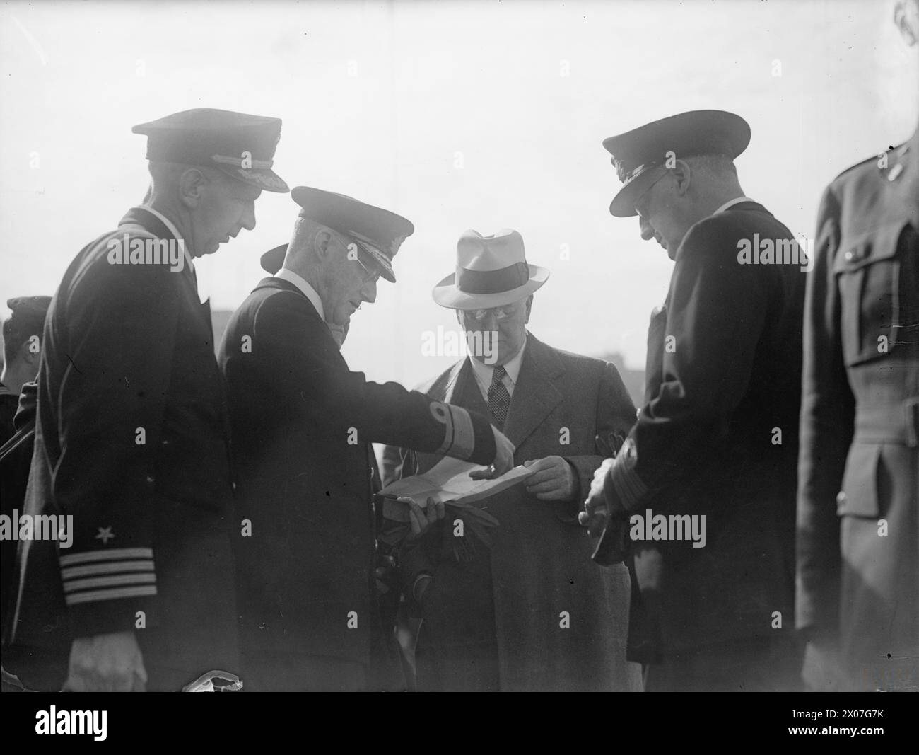 Colonel Frank Knox, US Navy Secretary, visits a British naval base in ...