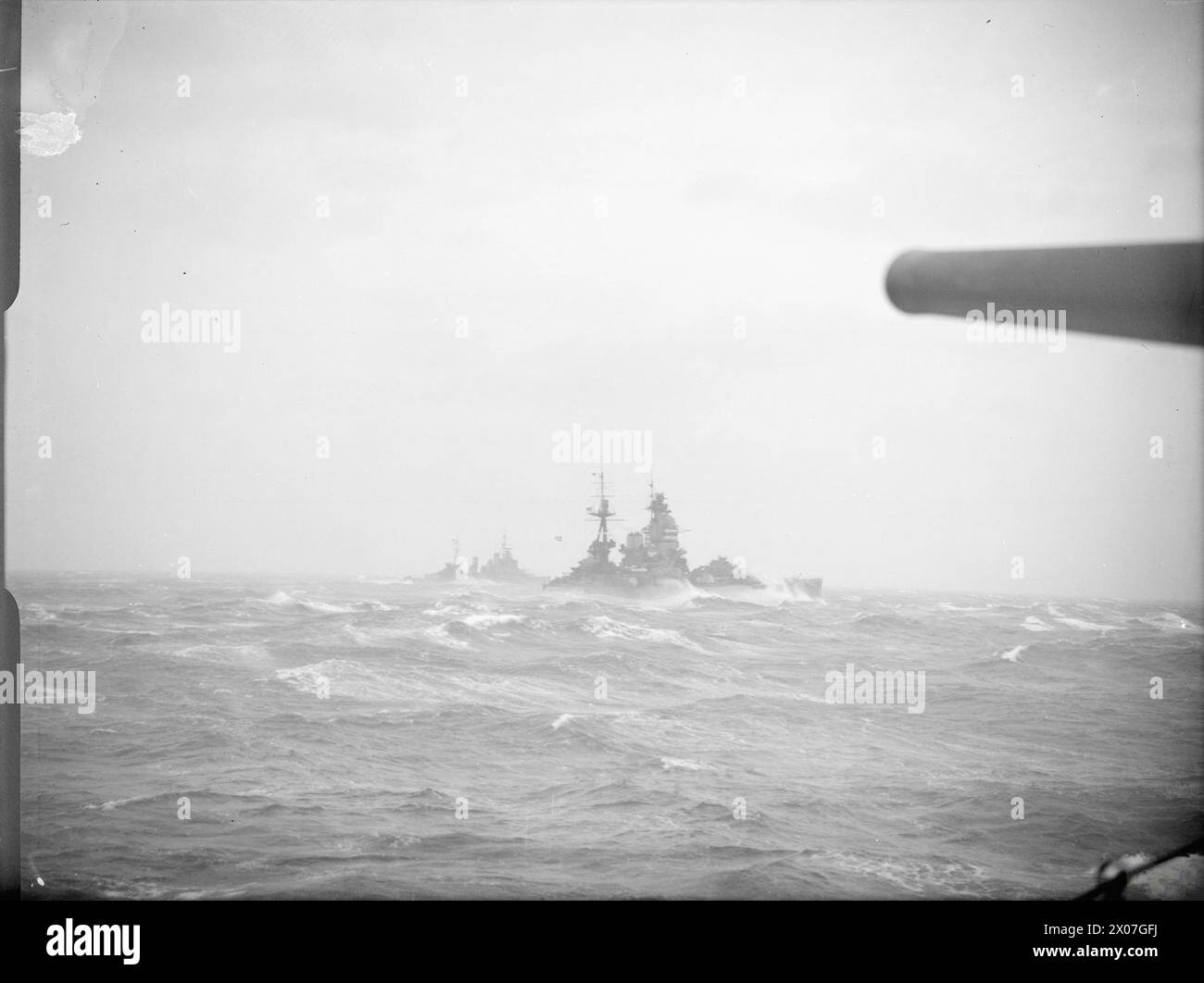 HMS Nelson navigated rough seas in the western Mediterranean, escorted ...