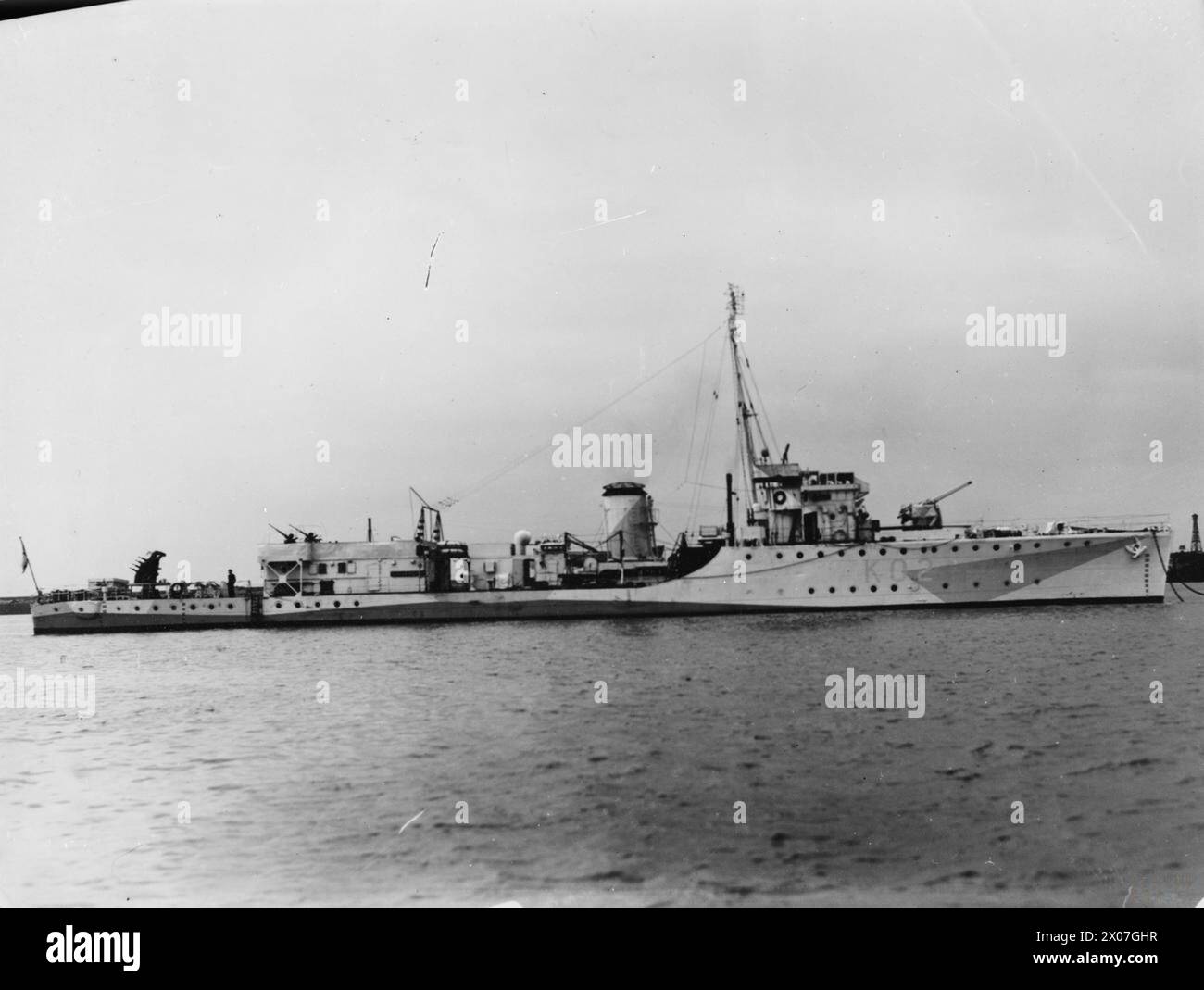 HMS Shearwater, a British Kingfisher-class patrol sloop, is shown ...