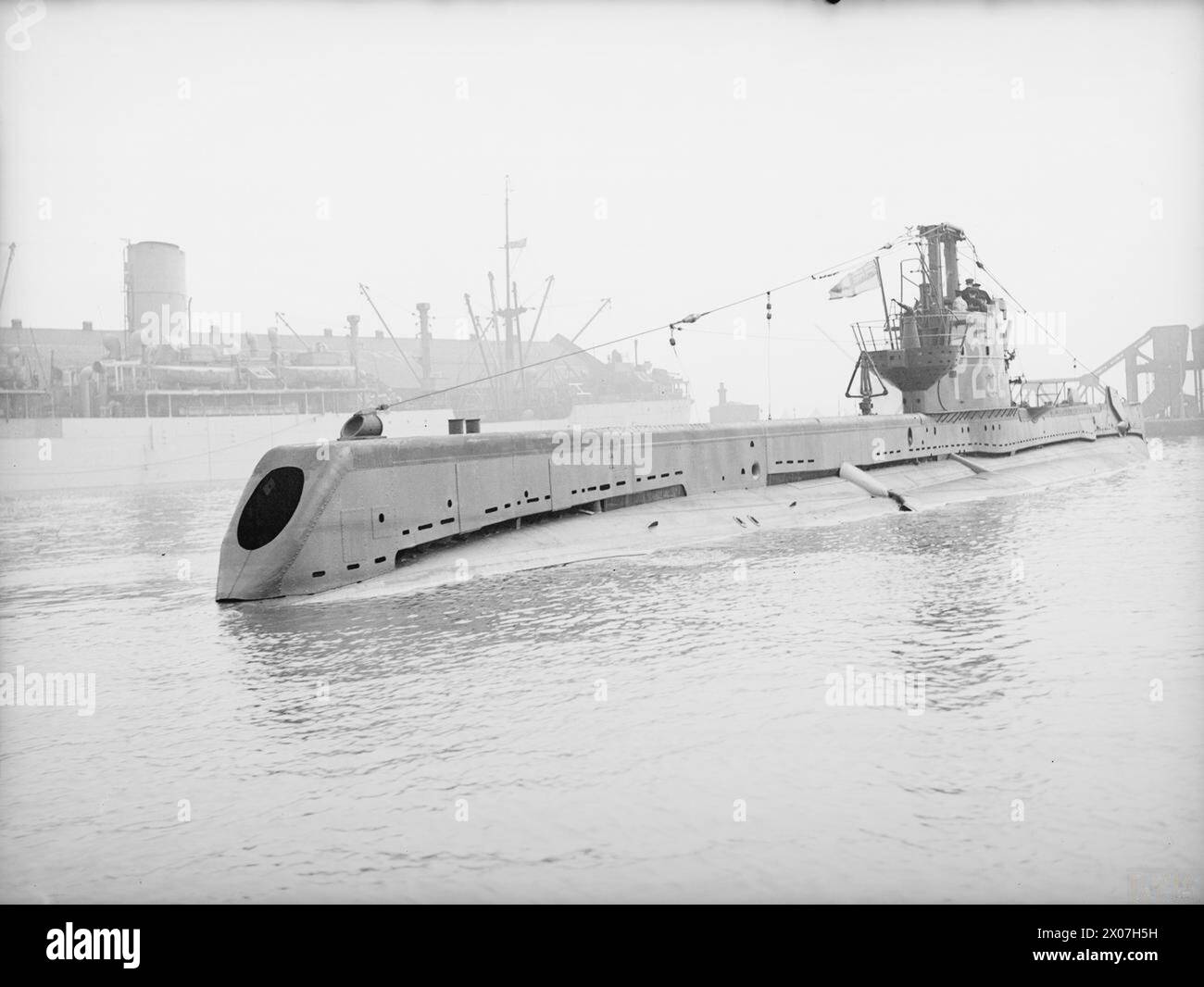 On 12 June 1943 at Wallasey Dock, the new submarine HMS Stonehenge is ...