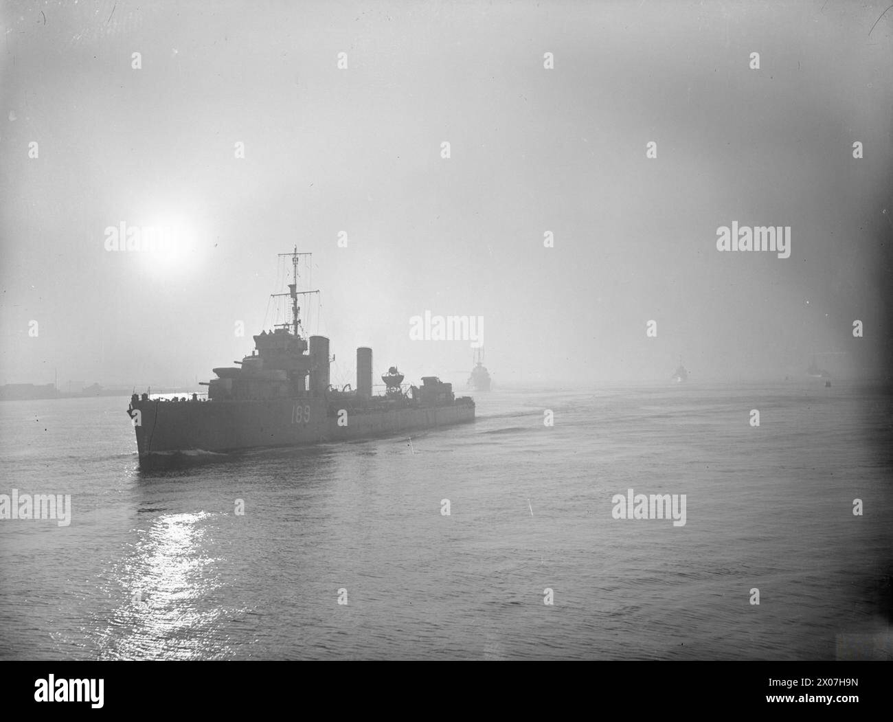 THE ROYAL NAVY DURING THE SECOND WORLD WAR - Destroyers at sea at dawn ...