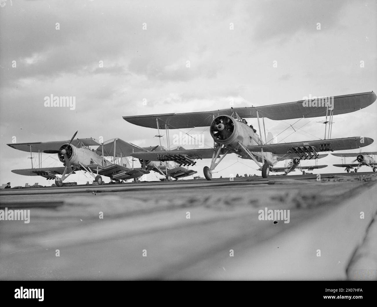 Fairey Swordfish aircraft prepare for take-off from HMS Tracker's ...