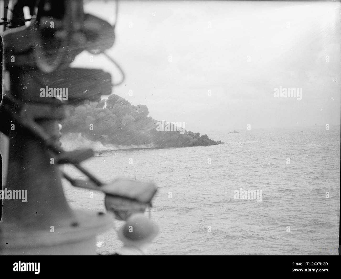 HMS Frobisher, a Royal Navy cruiser, bombarded enemy coastal positions ...