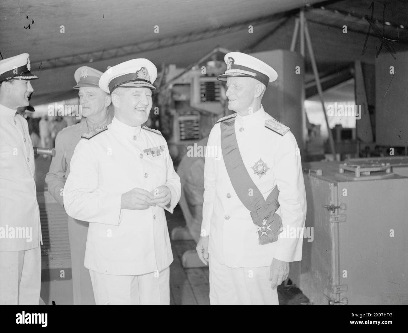 BRITISH HONOUR AMERICAN ADMIRAL. AUGUST 1945, ON BOARD HMS DUKE OF YORK ...