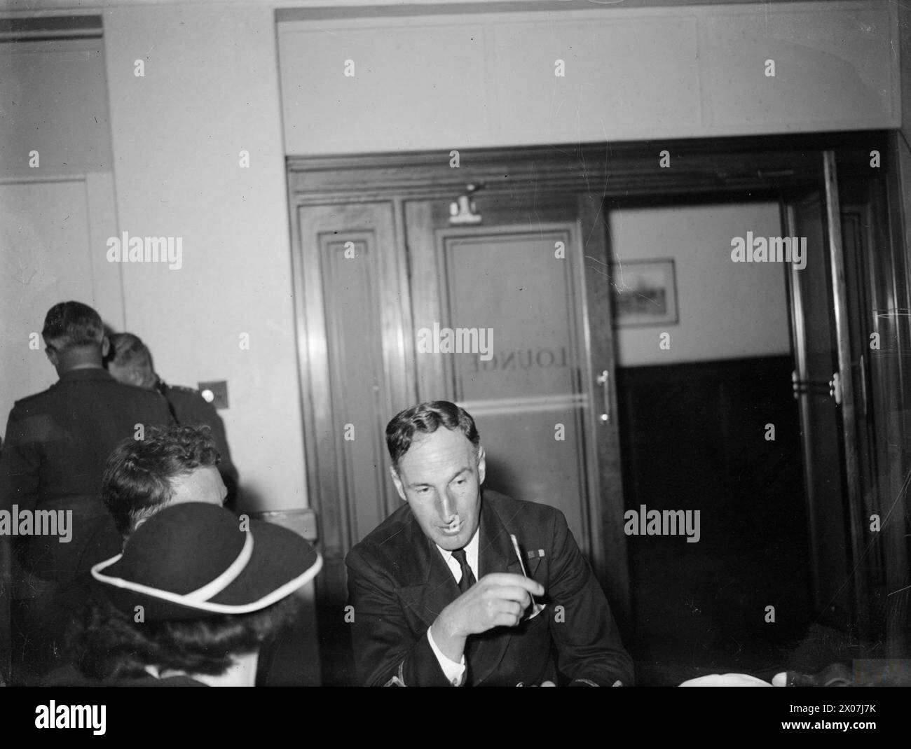 Sub-Lieutenant A.R. Pink serves as High Angle Gunnery Officer aboard ...