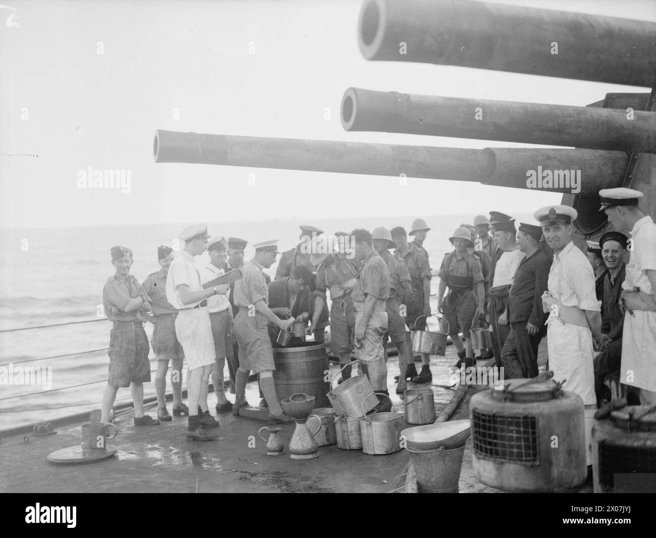 SOLDIERS TAKE PASSAGE IN THE CRUISER HMS MANCHESTER. JULY 1941, ON ...
