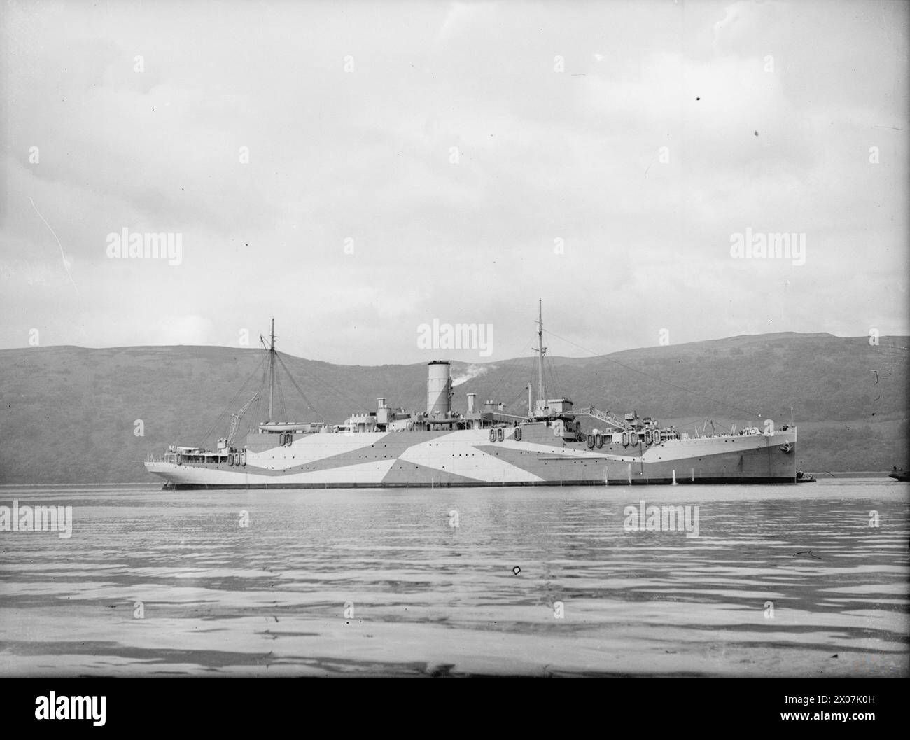 HMS Artifex, formerly a Cunard liner, served as a base repair ship and ...