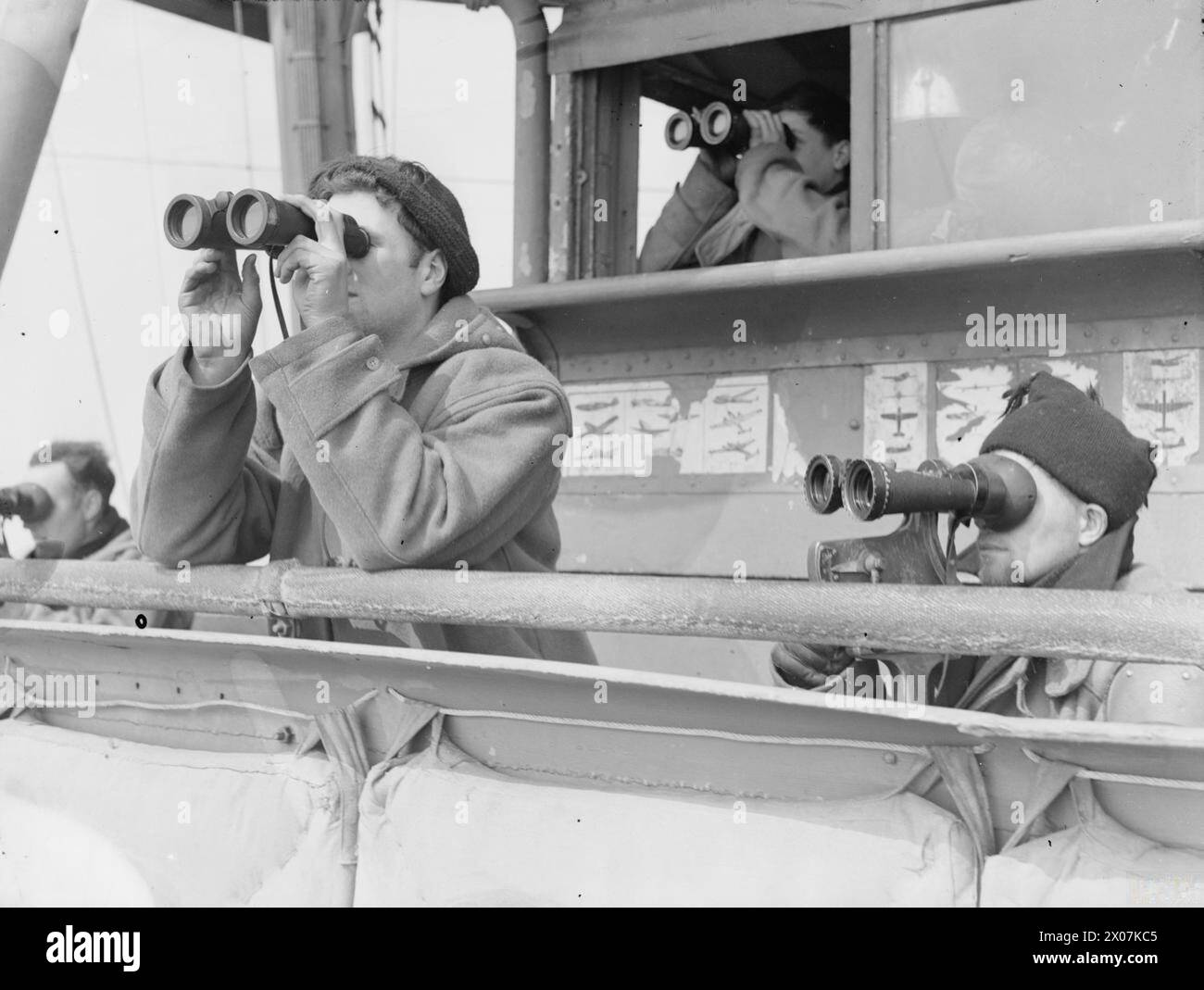 ON BOARD THE CRUISER HMS SUFFOLK ON PATROL. 1941. - Look-outs on the ...