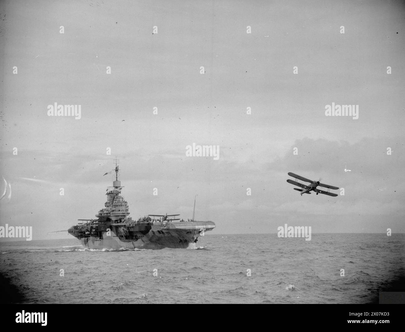 Fairey Albacore aircraft of No 820 Squadron Fleet Air Arm operate from ...
