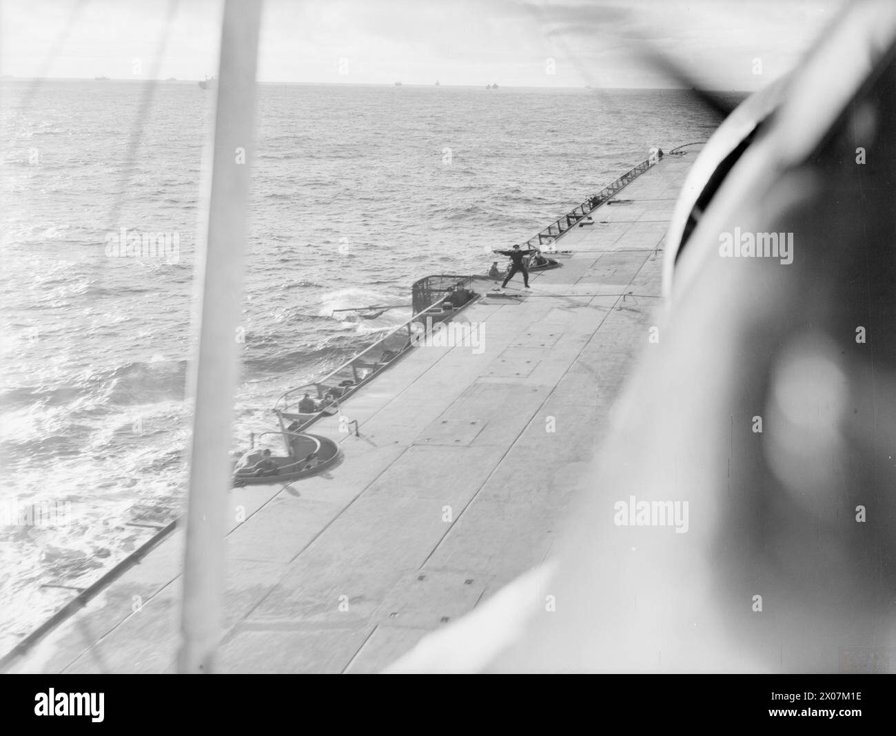 ON BOARD THE MERCHANT AIRCRAFT CARRIER EMPIRE MACANDREW. 27 MARCH 1944 ...