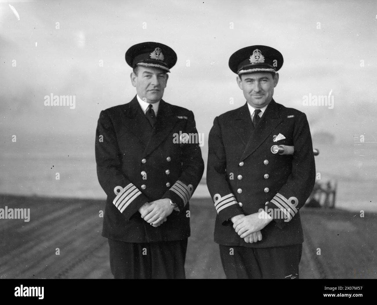 CAPTAIN AND COMMANDER OF THE ESCORT CARRIER SEARCHER. 18 OCTOBER 1943 ...