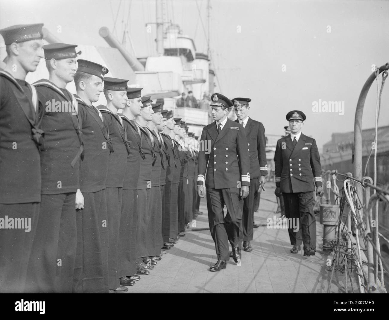 In 1941, HRH the Duke of Kent inspects the ship’s company aboard HMS ...