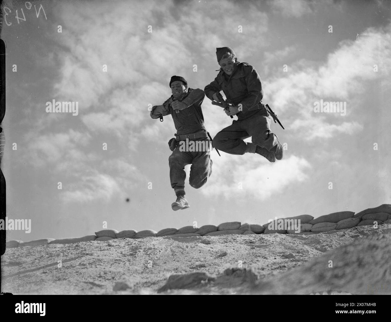 THE ROYAL NAVY DURING THE SECOND WORLD WAR - With guns raised, two ...