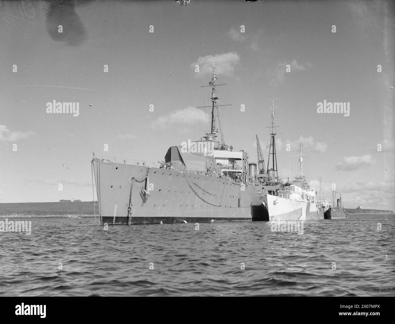 THE DAILY ROUTINE OF HMS TYNE, A DESTROYER DEPOT SHIP. FLEET ANCHORAGE ...