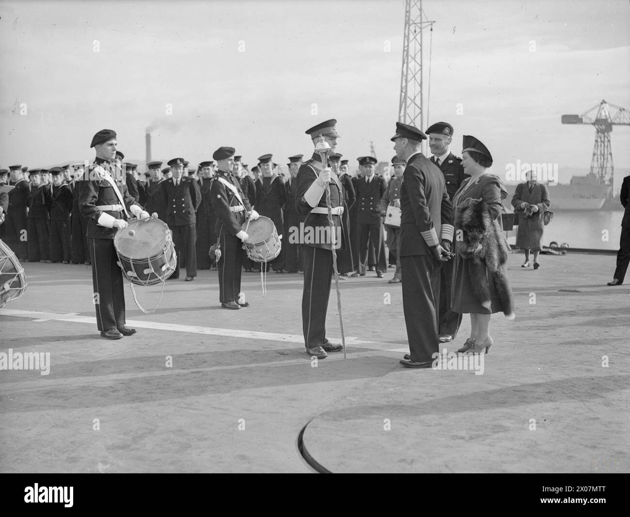 King George VI speaks with Bandmaster Camfield of the Royal Navy on ...