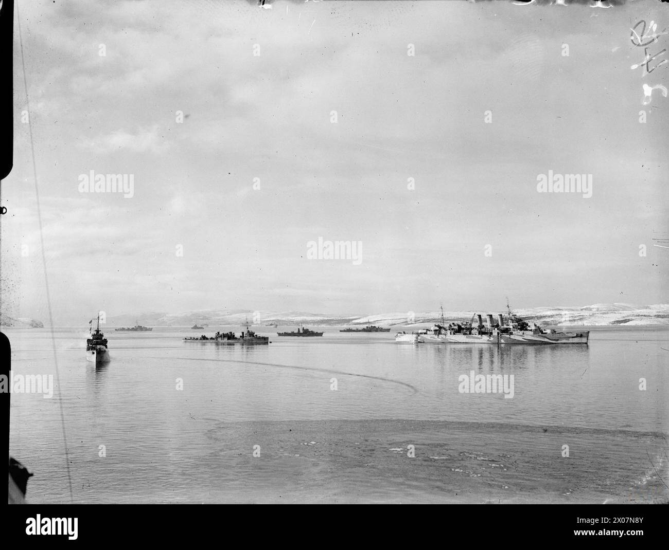 HMS Norfolk operates with destroyers and merchant ships in a Russian ...