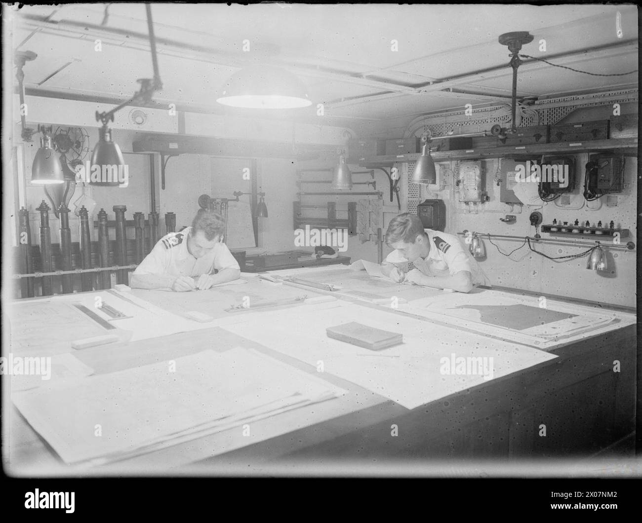 Lieutenants H O Forester and D W Halsam charted survey data aboard HMS ...