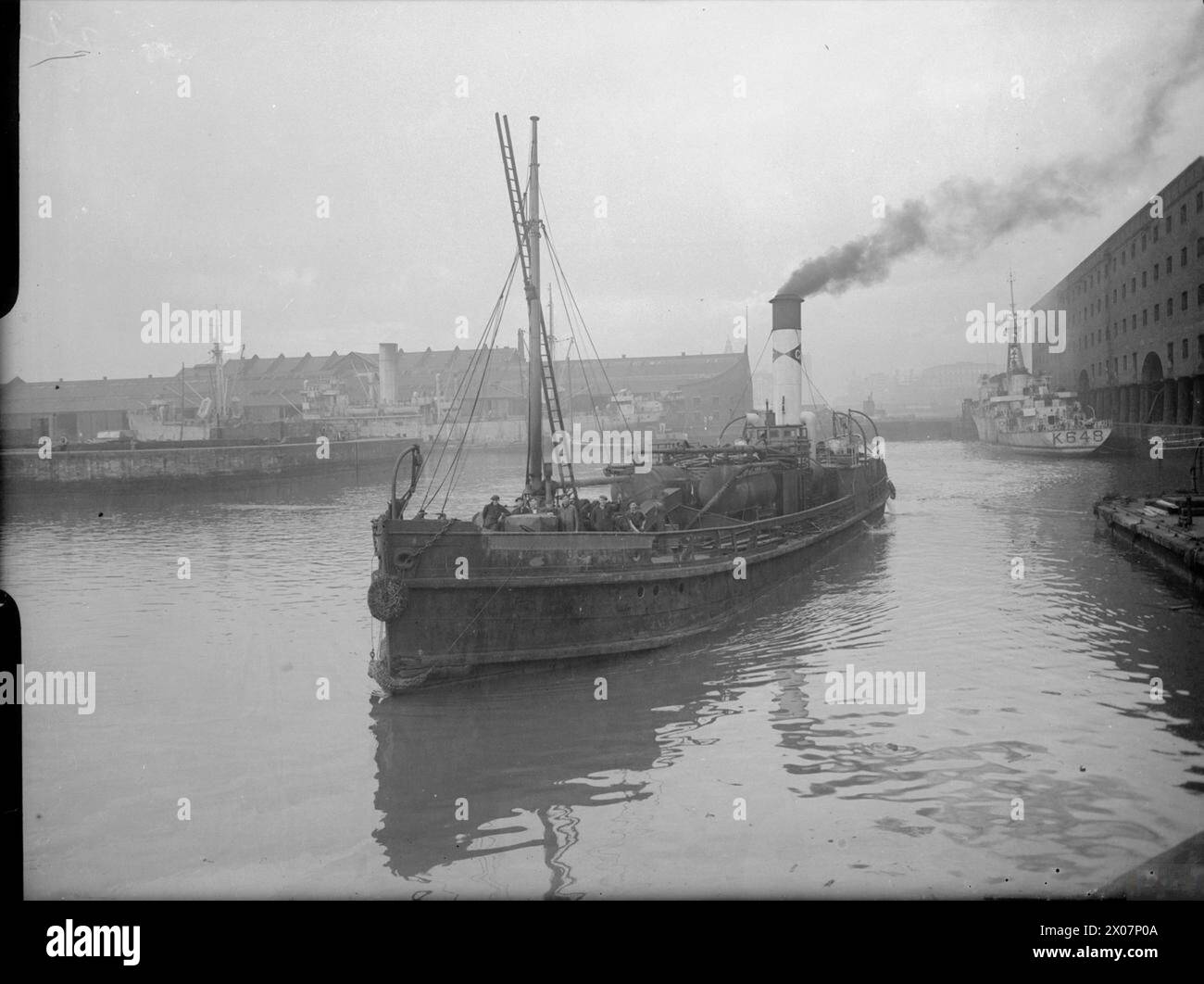 THE ROYAL NAVY DURING THE SECOND WORLD WAR - TULIP underway, in Wapping ...