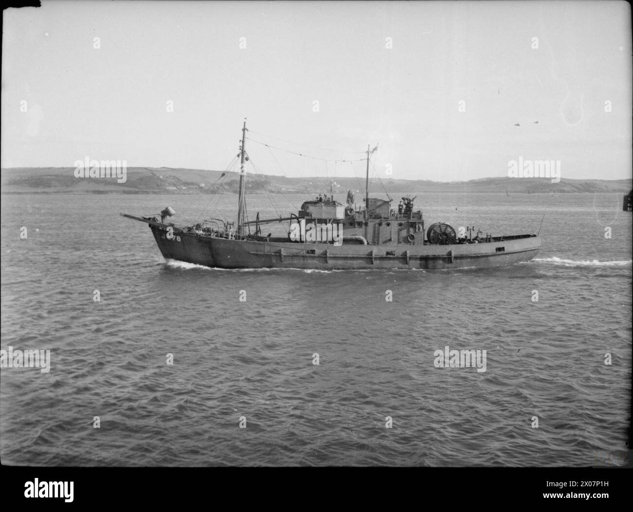 MMS 76, pennant number J 576, is underway performing Royal Navy ...