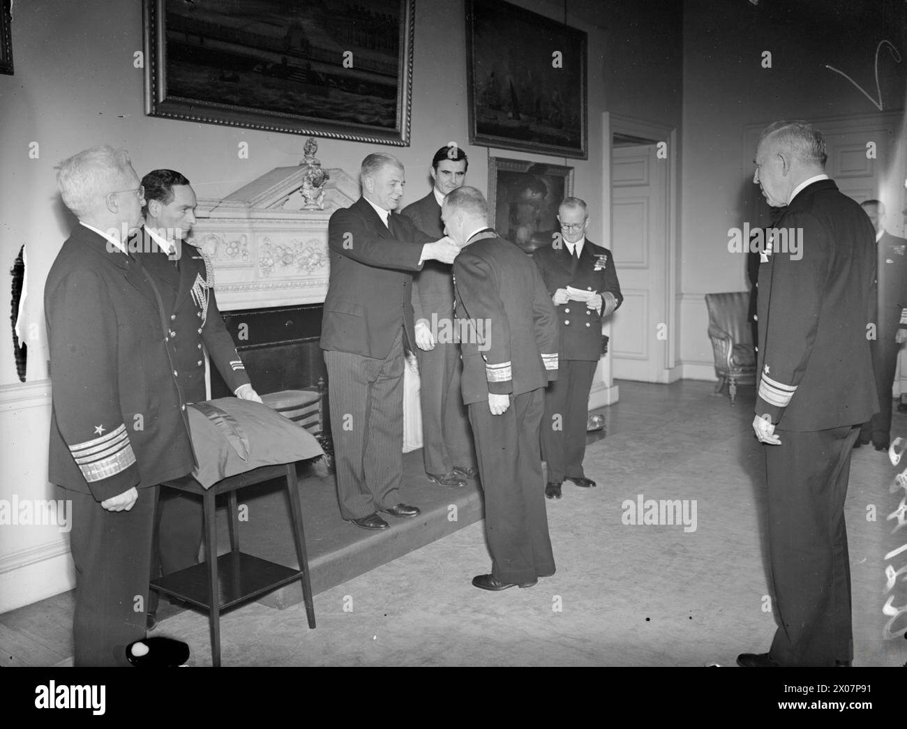 Rear Admirals Alan G. Kirk and John L. Hall of the US Navy receive the ...