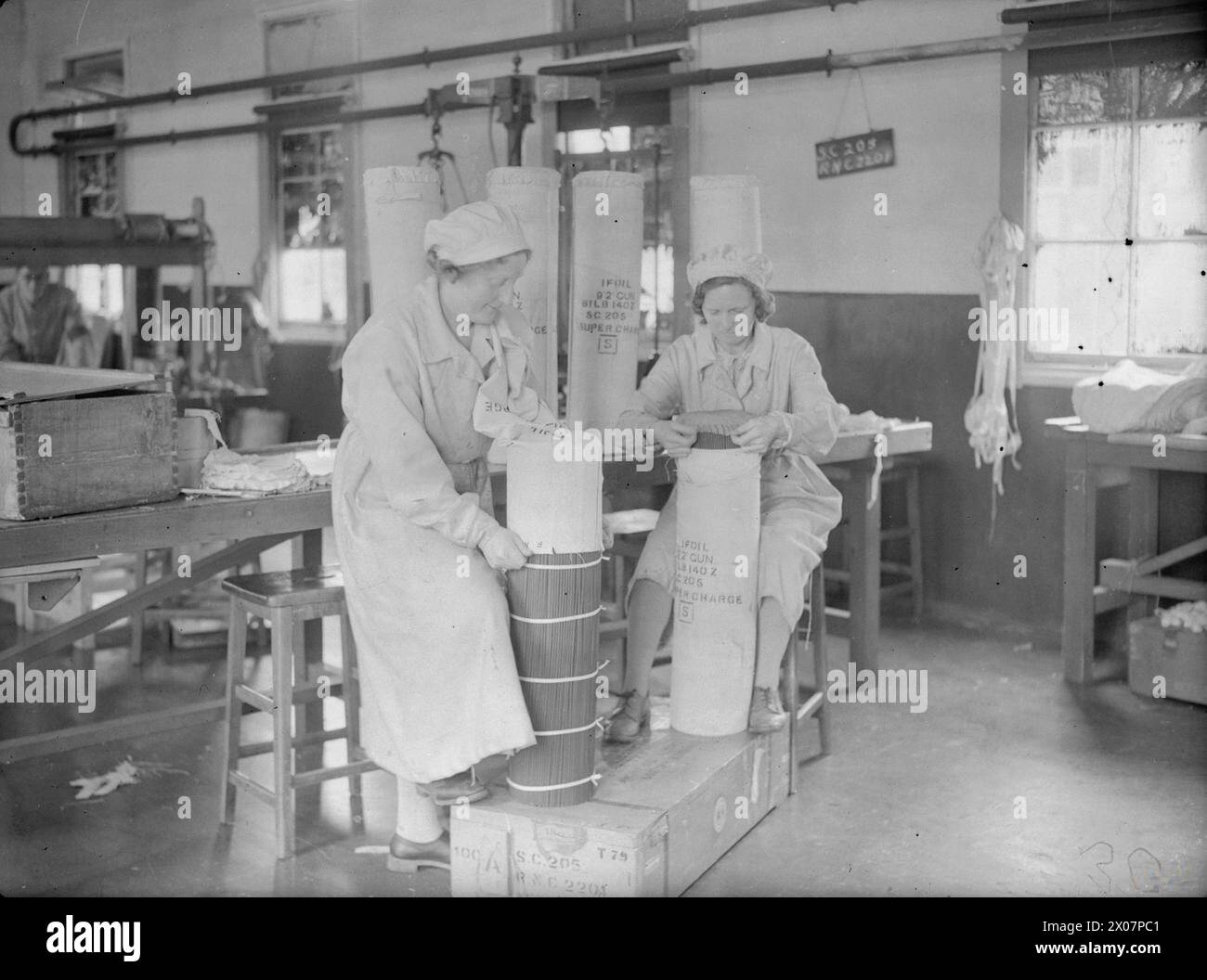 THE WOMEN BEHIND THE GUNS: MUNITIONS PRODUCTION IN BRITAIN, 1940 - Two ...