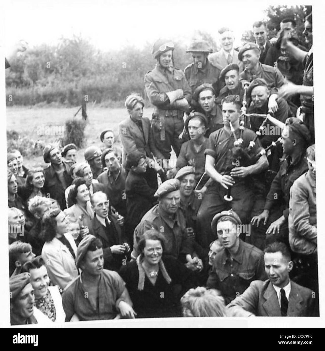 CROSSING THE BELGIUM DUTCH BORDER AT HAMONT. - Original wartime caption ...