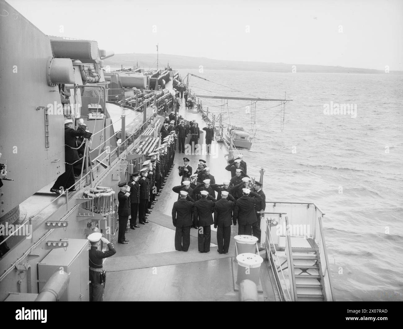 HM The King boards the US Battleship Washington on 7 June 1942 during a ...