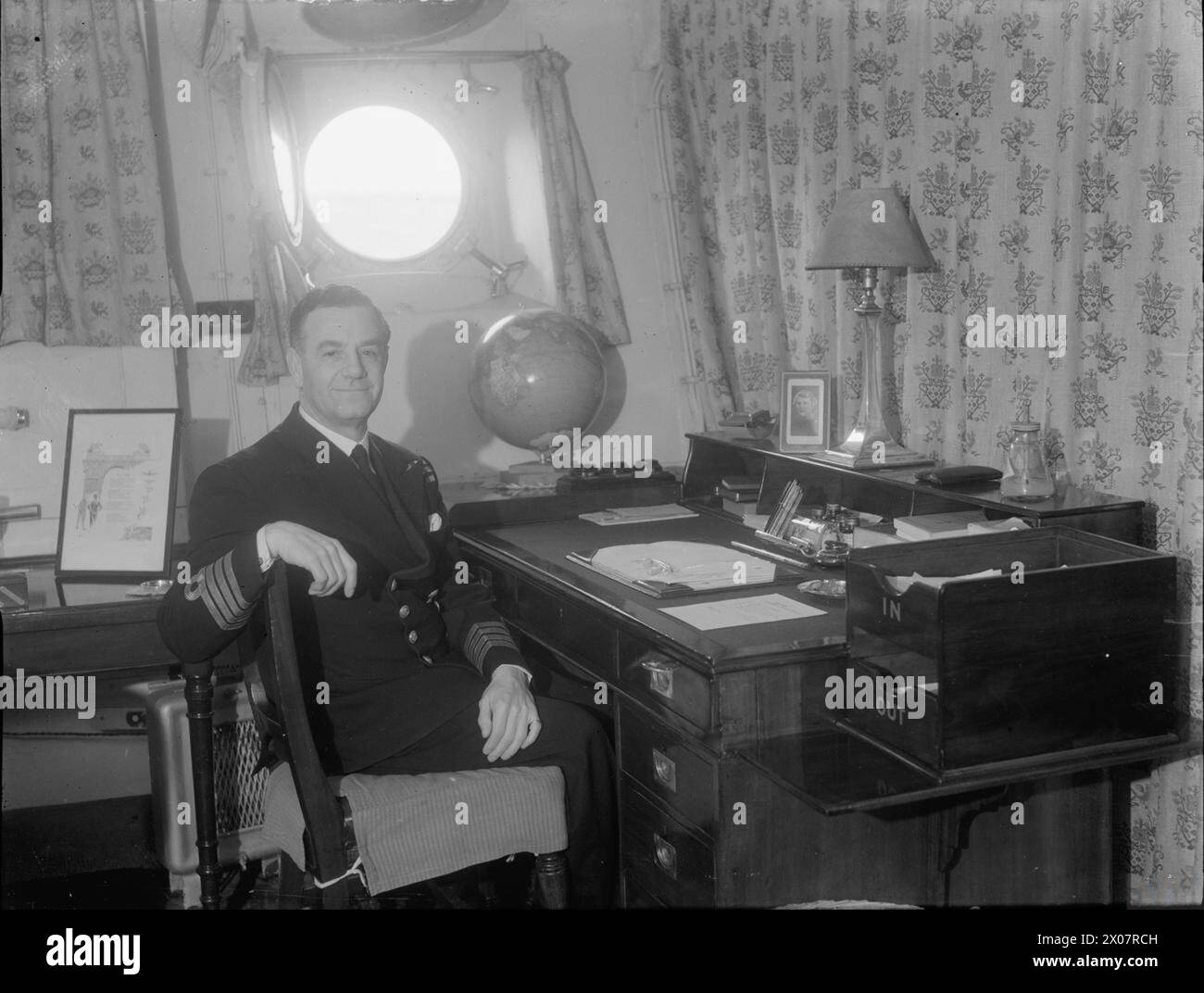 Captain G T Philip, DSO, DSC, RN, commanded HMS Furious and is pictured ...