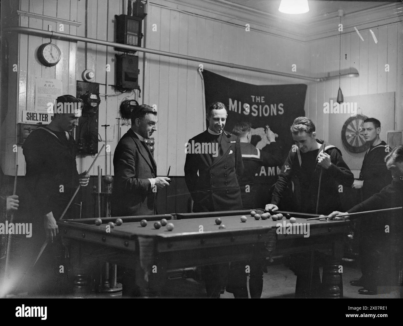 CHURCH OF ENGLAND CHAPLAIN. OCTOBER 1940, THE REVEREND S J GAMON ...