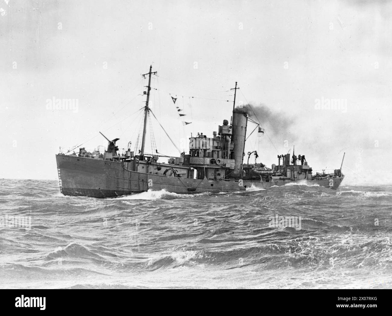 HMS Sir Geraint, a British Round Table class trawler, is at sea in 1942 ...