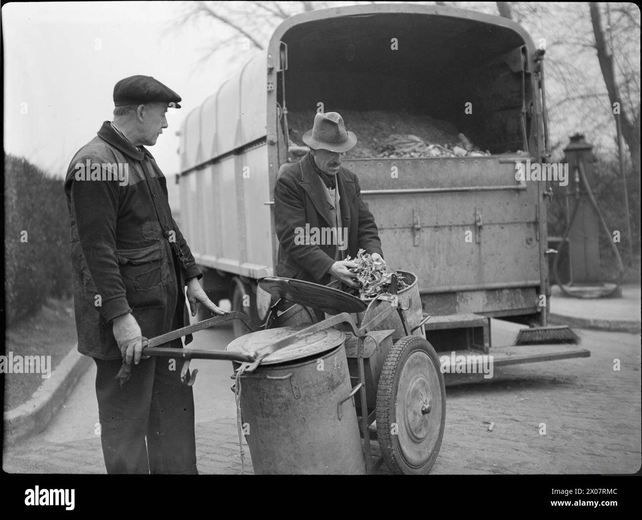 In 1942, British salvage workers sorted household scraps in trolleys ...