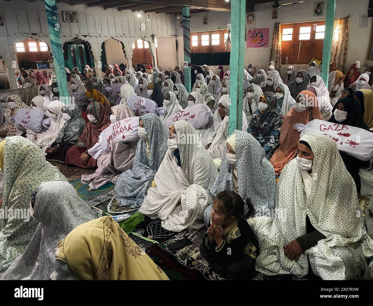 Budgam, India. 10th Apr, 2024. Kashmiri Muslim women holding white ...