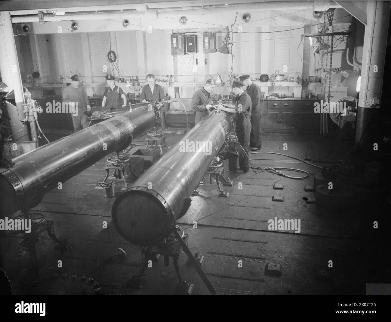 THE DAILY ROUTINE OF HMS TYNE, A DESTROYER DEPOT SHIP. FLEET ANCHORAGE ...